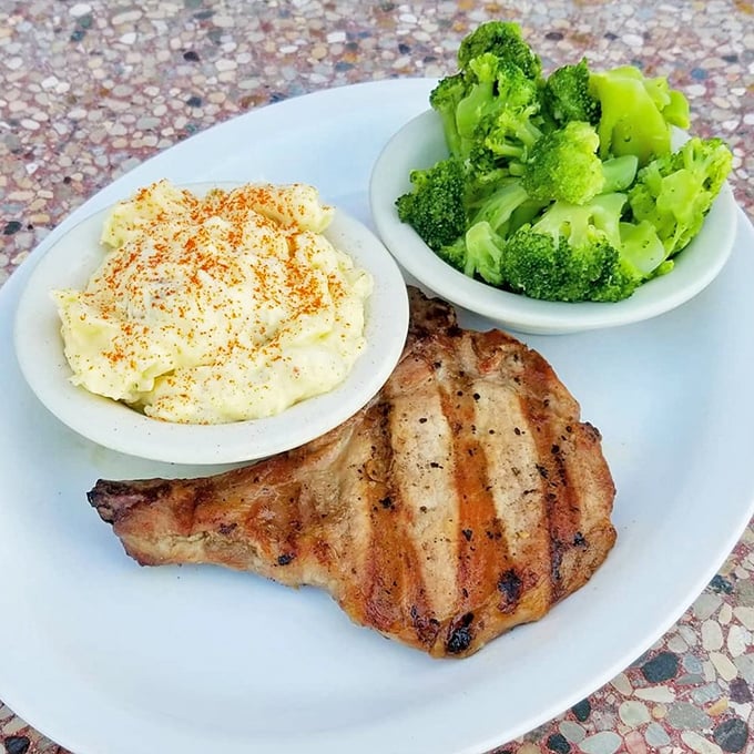 This isn't just a pork chop; it's proof that simple food done right can outshine any fancy-pants culinary trend from either coast.