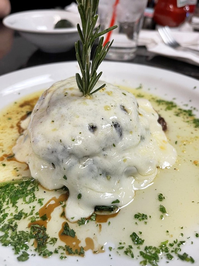 Not your average mushroom dish&mdash;this rosemary-topped creation swimming in savory broth looks like it graduated from culinary school with honors.