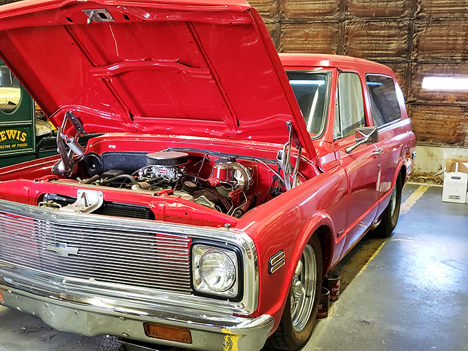 Cherry red perfection under the hood. This immaculately maintained engine bay is mechanical poetry&mdash;a symphony of pistons and valves frozen in time.