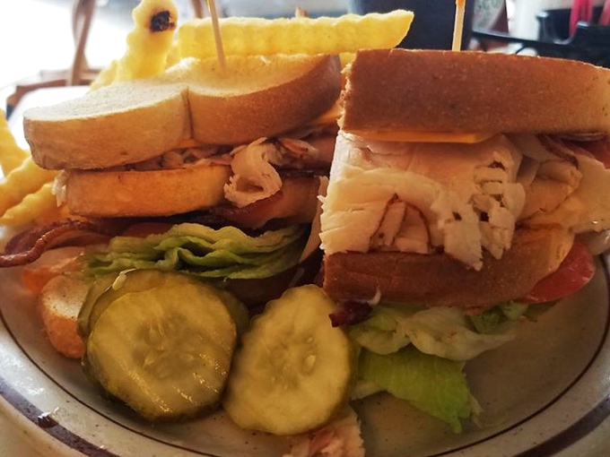 A sandwich built like it means business. This isn't some dainty tea party offering—it's the lunch equivalent of a firm handshake.