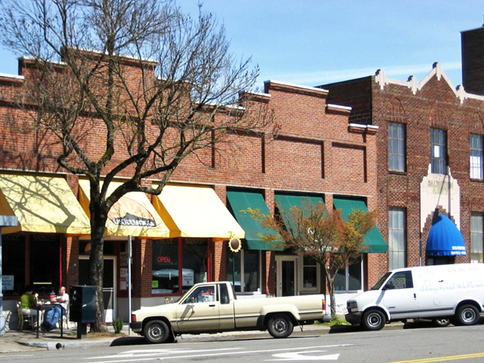 Downtown storefronts where your dollar stretches further than your grandkids' excuses for not calling more often.