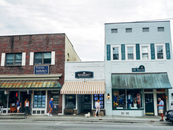 Downtown strolling: the original social networking. These awning-shaded sidewalks have connected more people than Facebook, with considerably better results.