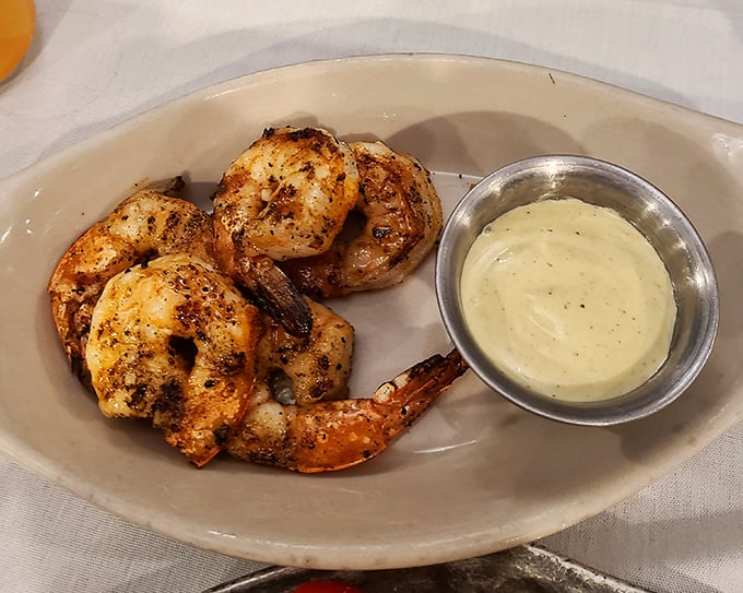 These aren't just shrimp &ndash; they're plump little vessels of oceanic delight, perfectly seasoned and waiting to dive into that creamy dipping sauce.
