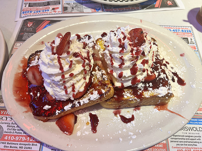 Dessert masquerading as breakfast! Strawberry stuffed French toast crowned with twin peaks of whipped cream that would make Agent Cooper swoon.