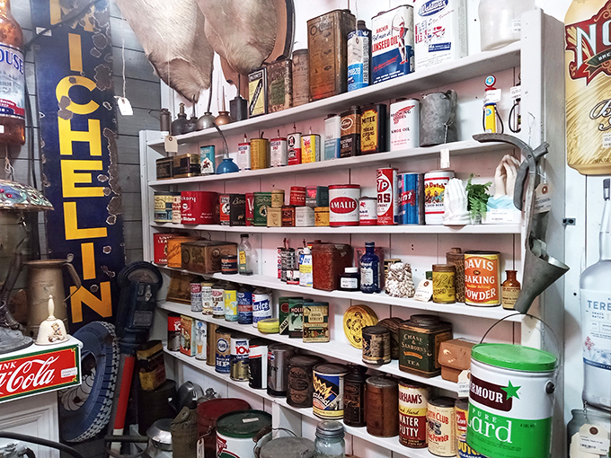 Vintage advertising cans line up like soldiers of commerce past&mdash;when packaging was art and brand loyalty spanned generations.