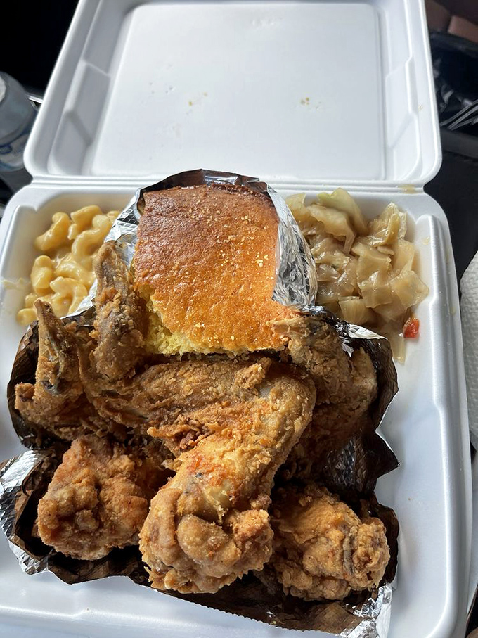 Crispy wings nestled beside tender cabbage and cornbread that could make a grown person weep. This is what they mean by "comfort food."