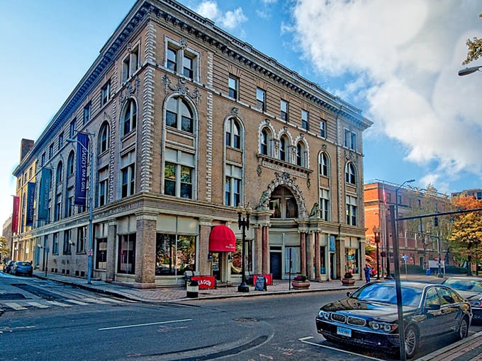 This Bridgeport street scene showcases the city's historic brick buildings, where affordable urban living meets New England charm.