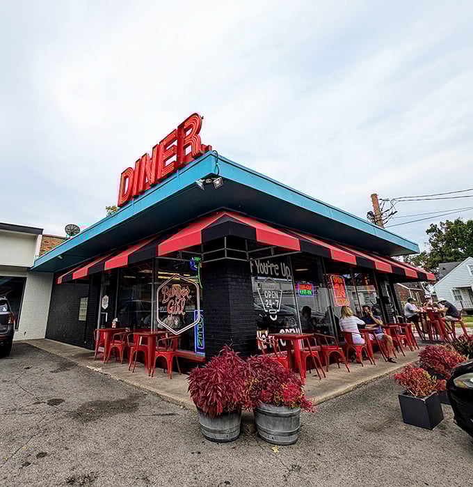 Burger Girl's retro-cool black exterior with that glorious red DINER sign is basically a time machine disguised as a restaurant.