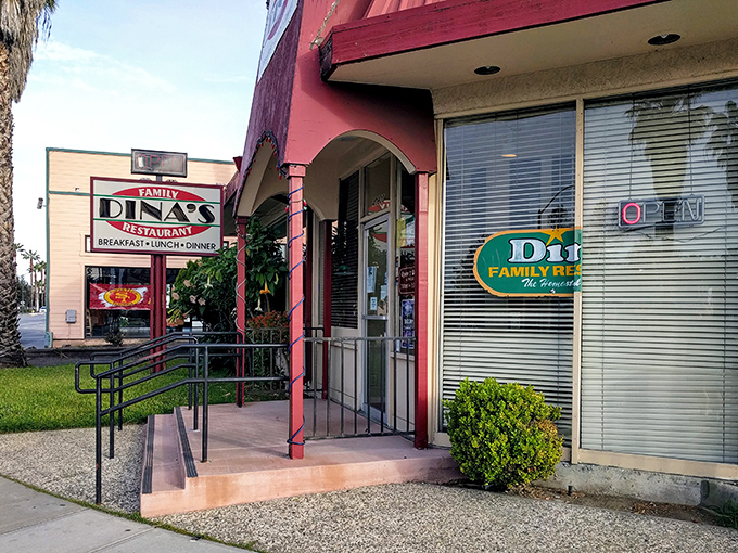 Dina's Family Restaurant: That pink exterior isn't just a color choice&mdash;it's a bold declaration that comfort food lives here.