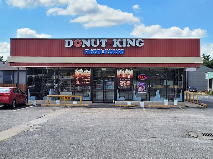 Donut King's bold red signage makes a royal proclamation: serious donut business happens here. The crown jewels of Norman's breakfast scene!