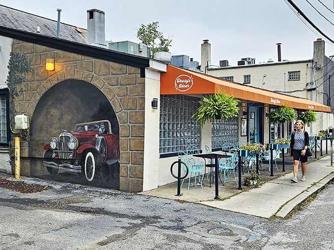 Doozy's vintage-inspired facade with its classic car mural is like finding a perfectly preserved vinyl record in a world of digital downloads.