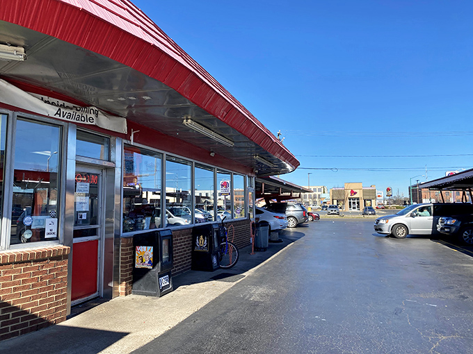Doumar's distinctive red roof curves like a smile, welcoming hungry visitors to a slice of American dining history.