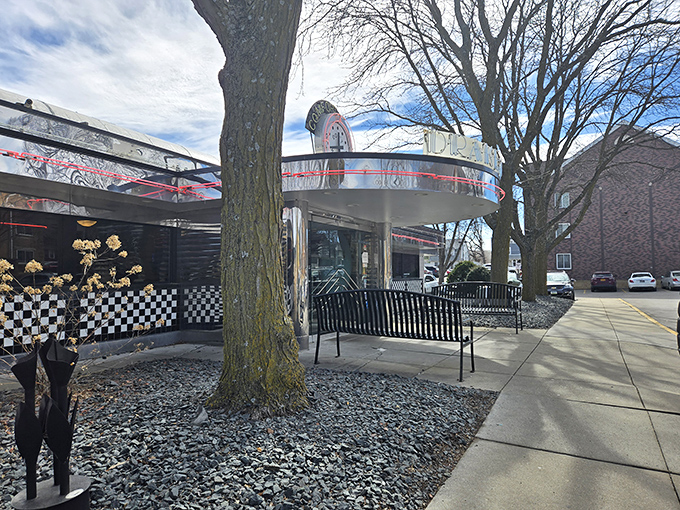 Drake Diner's curved chrome exterior gleams like a time machine to the golden age of American dining. Nostalgia never tasted so good.