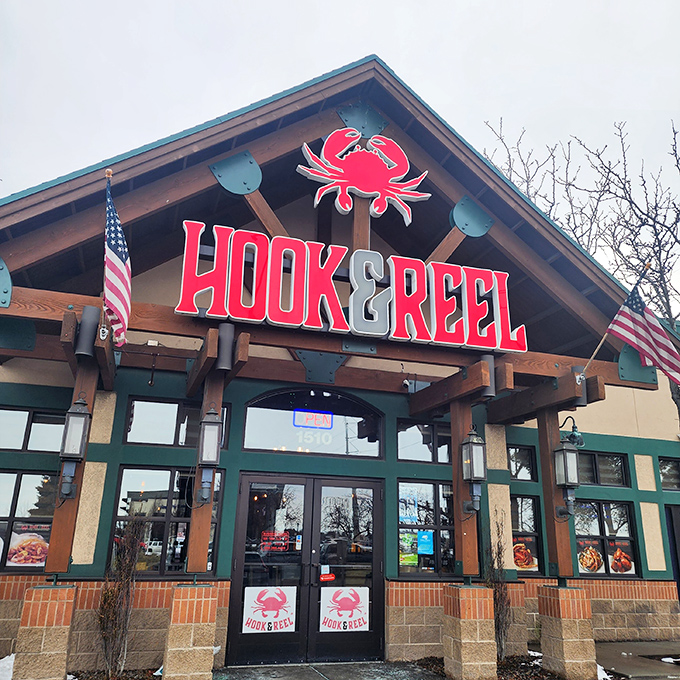 Hook & Reel's bold red crab sign is like a beacon for seafood lovers, promising Cajun spices that will transport your taste buds straight to Louisiana.