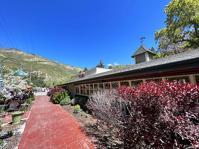 Ruth's Diner's red brick pathway leads to culinary nirvana, nestled against mountains that make every meal feel like a special occasion.