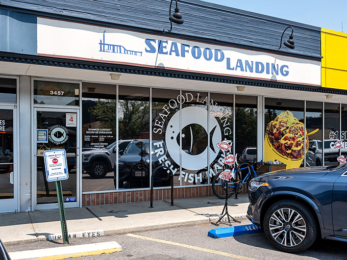 Seafood Landing's no-nonsense storefront tells you exactly what matters here: fresh fish, not fancy decor. That circular logo is like a porthole to flavor town.