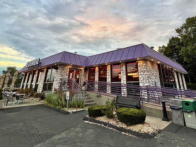 Shoreline Diner's stone facade and purple roof stand out like a well-dressed gentleman at a casual cookout. 