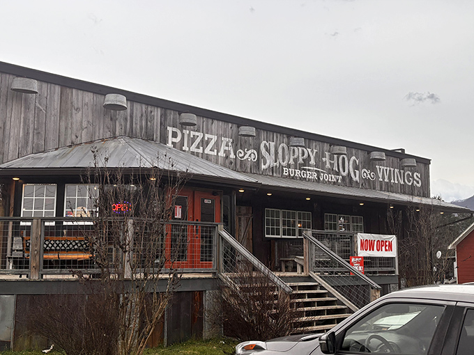 Rustic charm meets serious flavor at Sloppy Hog. This weathered wooden building houses burger magic in the Smoky Mountain foothills.