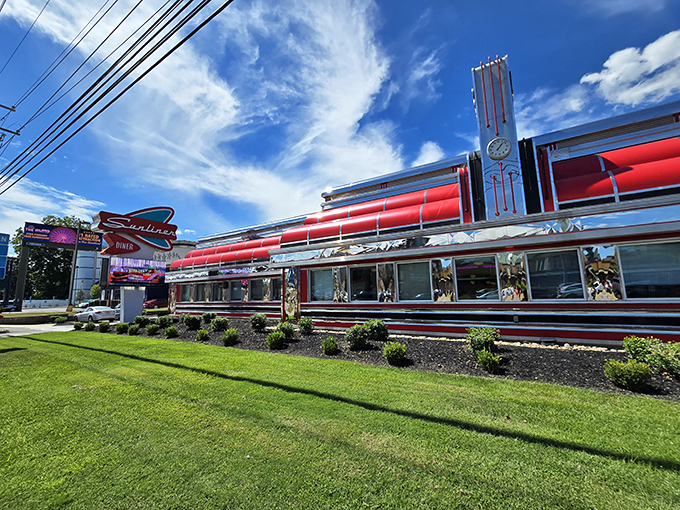 Sunliner Diner's gleaming retro exterior promises a blast from the past with a side of crispy fries. Architectural eye candy that feeds the soul!