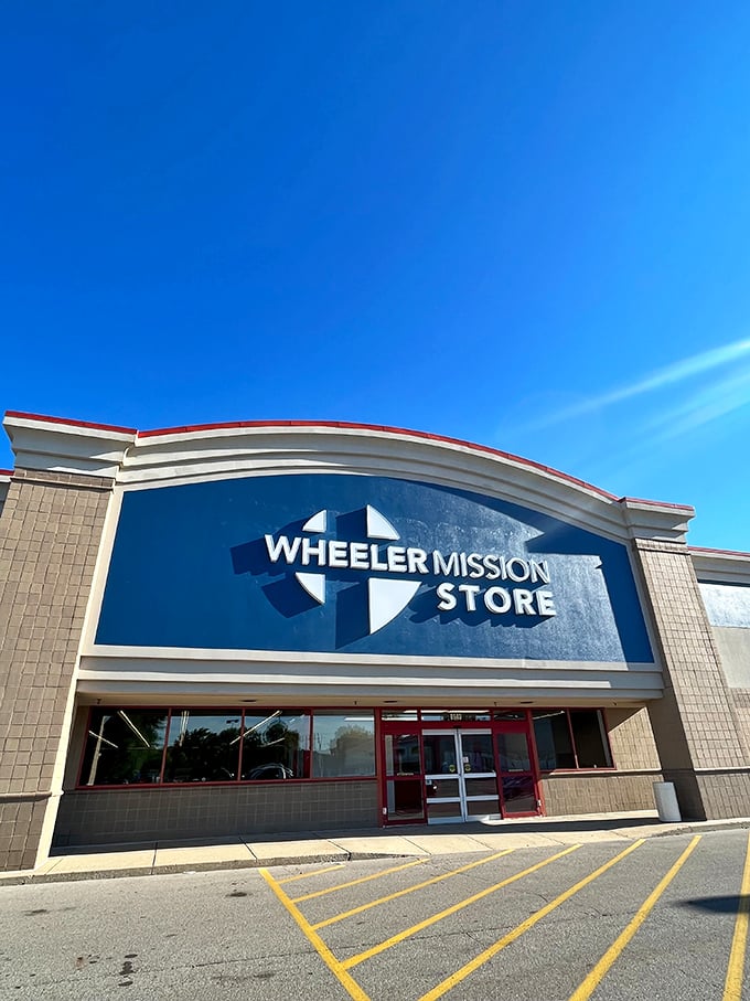 Wheeler Mission Store's bold blue signage promises more than just bargains&mdash;it's a beacon of hope where your shopping dollars directly support those needing shelter.