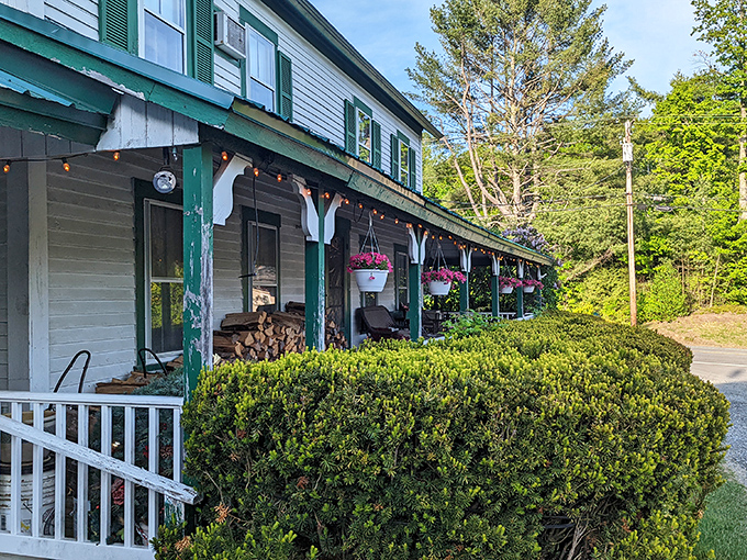 Hanging baskets and twinkling lights create the perfect porch setting for pre-steak cocktails at this hidden gem.
