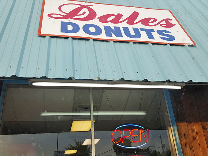 The glowing "OPEN" sign in the window is the bat signal for donut lovers &ndash; summoning sweet-toothed heroes from across town.