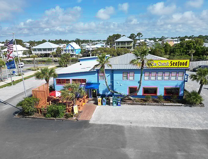 DeSoto's Seafood: Palm trees and a Caribbean-blue building &ndash; visual appetizers before the main course of Gulf-fresh seafood inside.