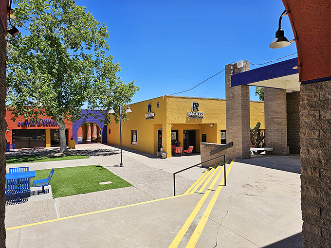 Colorful storefronts in Green Valley bring vibrant energy to the landscape, like confetti scattered across the southwestern palette.