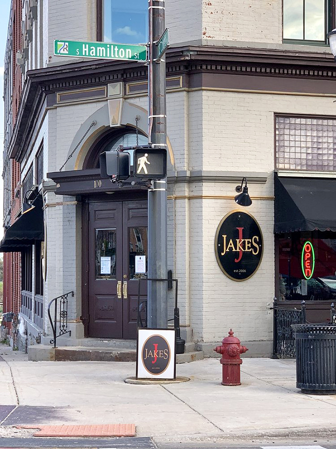 Morning light catches Jake's classic facade, where the street corner has witnessed countless celebrations over perfectly cooked ribeyes.
