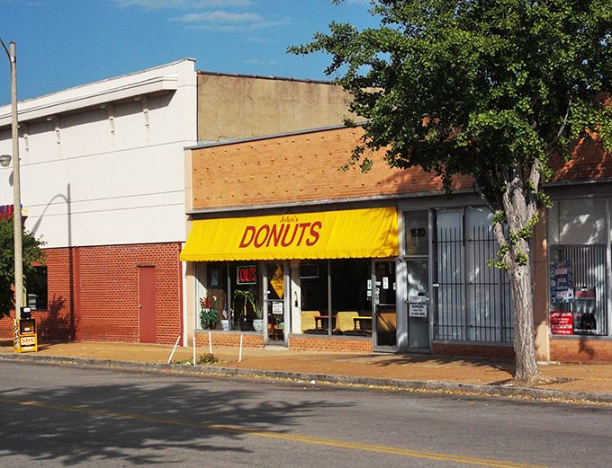 That classic storefront with its simple "DONUTS" sign tells you everything you need to know – no frills, just amazing donuts.