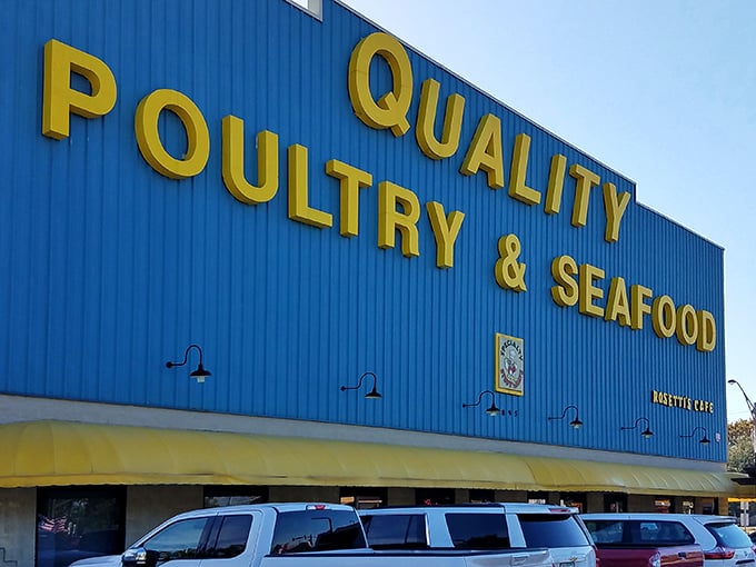 Those bright yellow letters against blue siding are like a maritime flag signaling "Fresh seafood ahead!" No Instagram filter needed.