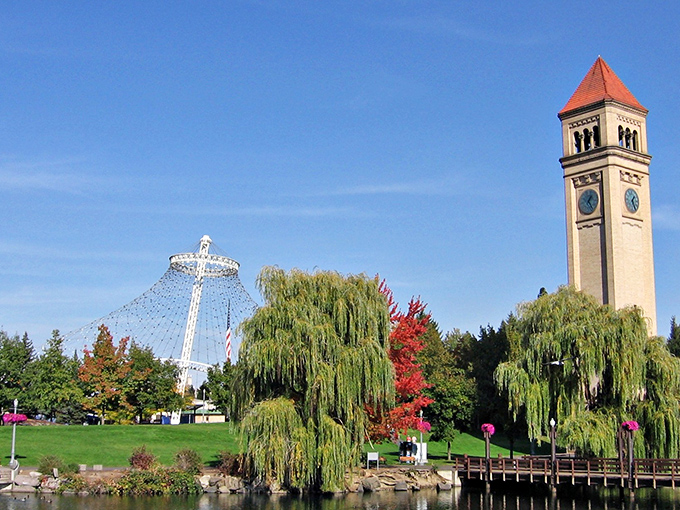 The iconic clock tower watches over Spokane's riverfront park, where urban energy meets wilderness wonder.