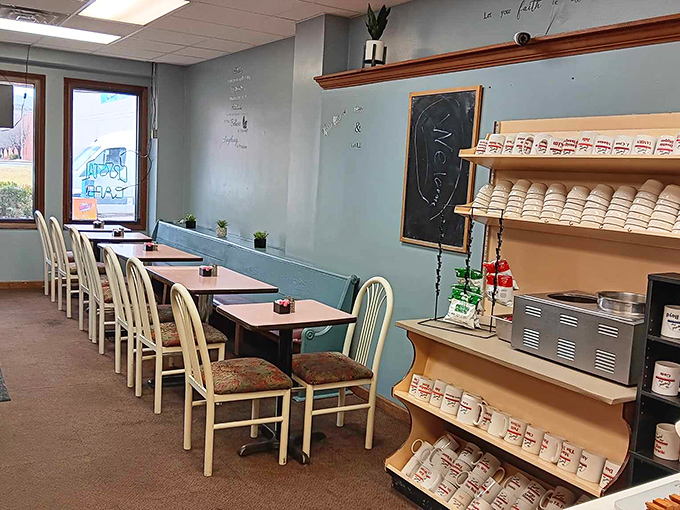 Crystal Cafe: Simple tables, mismatched chairs, and coffee mugs lined up like soldiers&mdash;this isn't decoration, it's a battlefield ready for serious eating.