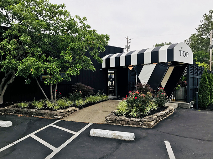 Landscaped entrance leading to meat paradise&mdash;The Top knows first impressions matter almost as much as the steak.