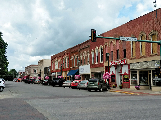 John Wayne Drive runs through Winterset, where the real stars are the neighbors who still bring casseroles when you're sick.