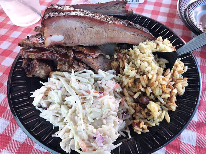 A plate that answers the eternal question: "Why choose one meat when you can have several?" Coleslaw provides the illusion of virtue.