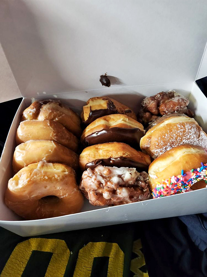 A dozen reasons to be late for work. The assortment includes what appears to be their famous "chop suey" &ndash; the delicious Frankenstein of the donut world.