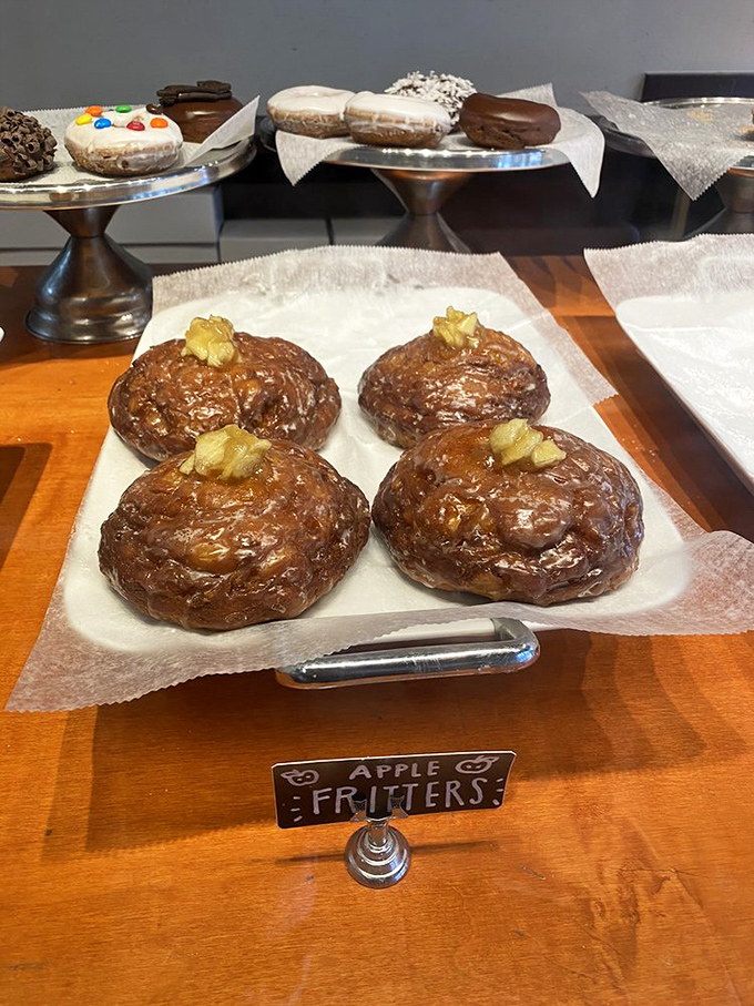 Apple fritters&mdash;those magnificent, misshapen rebels of the donut world. Chunks of caramelized fruit create pockets of joy in these glistening, glazed beauties.