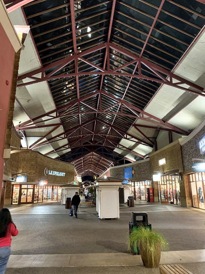 Evening shopping under the soaring timber-framed ceilings feels almost cathedral-like &ndash; if cathedrals worshipped the holy trinity of savings, selection, and style.