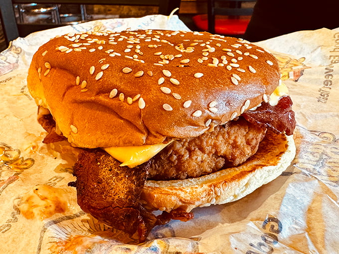 When chicken wants to join the burger party. Golden-brown perfection nestled between a toasted bun with bacon playing the perfect supporting role.