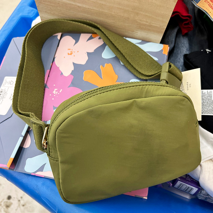This olive green handbag isn't just fashion—it's a victory trophy that whispers, "I paid less for this than you did for lunch."