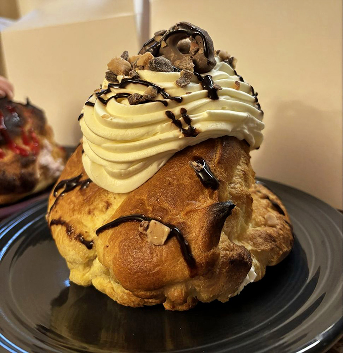 Imagine if a cream puff and a pretzel had a delicious baby &ndash; this chocolate-drizzled masterpiece would be their gifted offspring.
