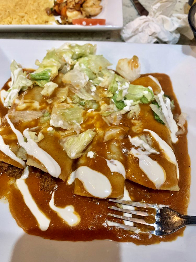 The rich sauce cascading over these enchiladas is doing what Frank Sinatra did to music&mdash;making something familiar feel brand new and utterly magical.