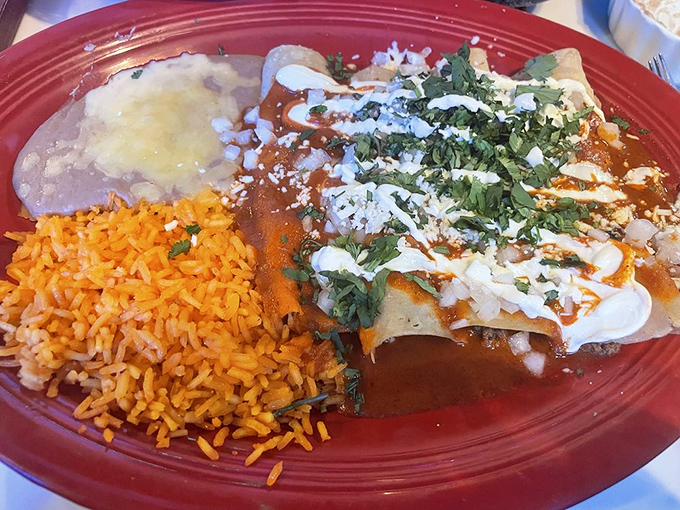 These enchiladas aren't just wrapped tortillas&mdash;they're little packages of joy delivered straight to your taste buds. The sauce-to-cheese ratio is mathematical perfection.