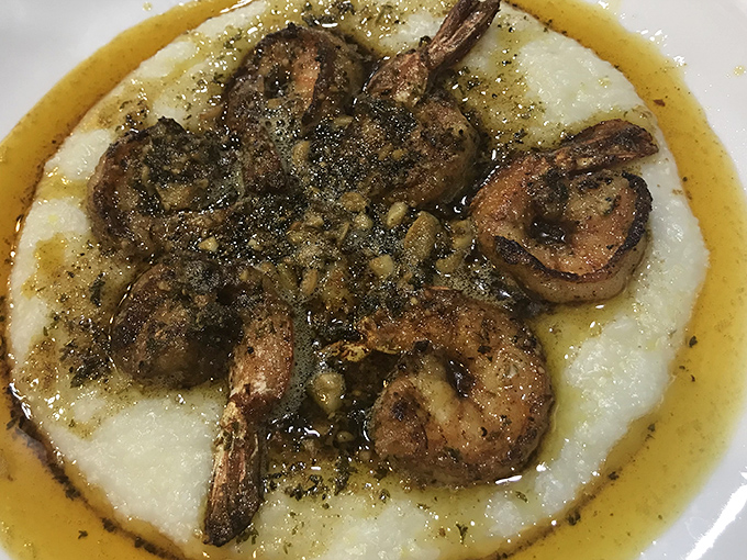 This isn't just shrimp and grits - it's a masterclass in texture and flavor that makes you question why you'd ever eat anything else for breakfast again.