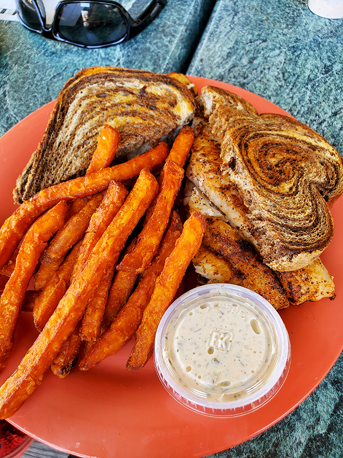 When your fish sandwich requires two hands and complete concentration, you know you've found something special. Those fries aren't just sidekicks&mdash;they're co-stars.