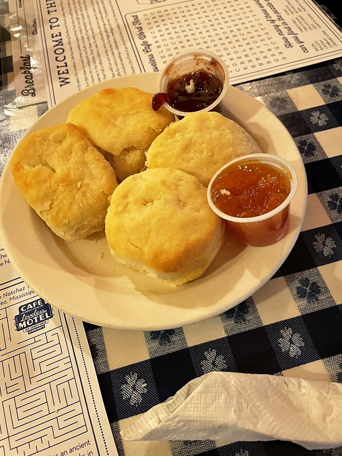 These aren't just biscuits; they're cloud-like pillows of Southern perfection, waiting to be slathered with preserves that taste like summer in a jar.