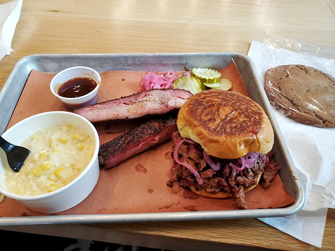 The barbecue trifecta: smoky meat, golden mac 'n' cheese, and a sandwich that requires both hands and a strategy. Napkins: non-negotiable.