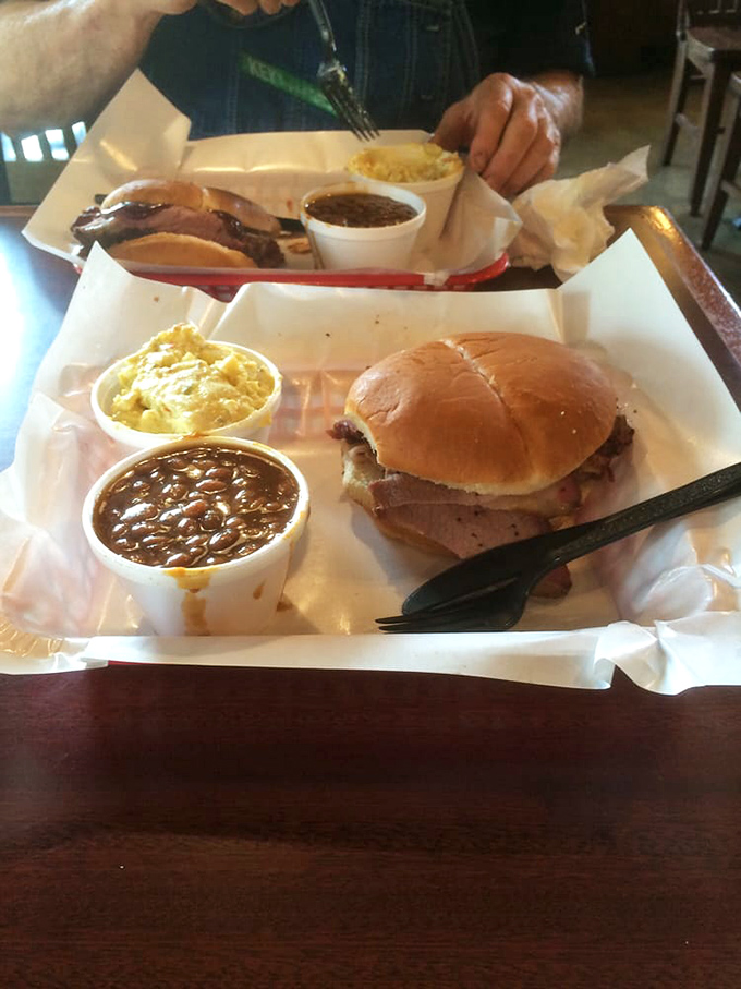 In the sandwich world, this is royalty. Brisket nestled in a soft bun with sides that don't compete&mdash;they complement, like a well-rehearsed jazz quartet.