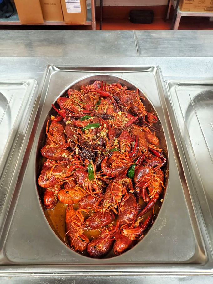 Crawfish so red they look like they're blushing from all the attention. Cajun-style means you'll need extra napkins and zero dignity.